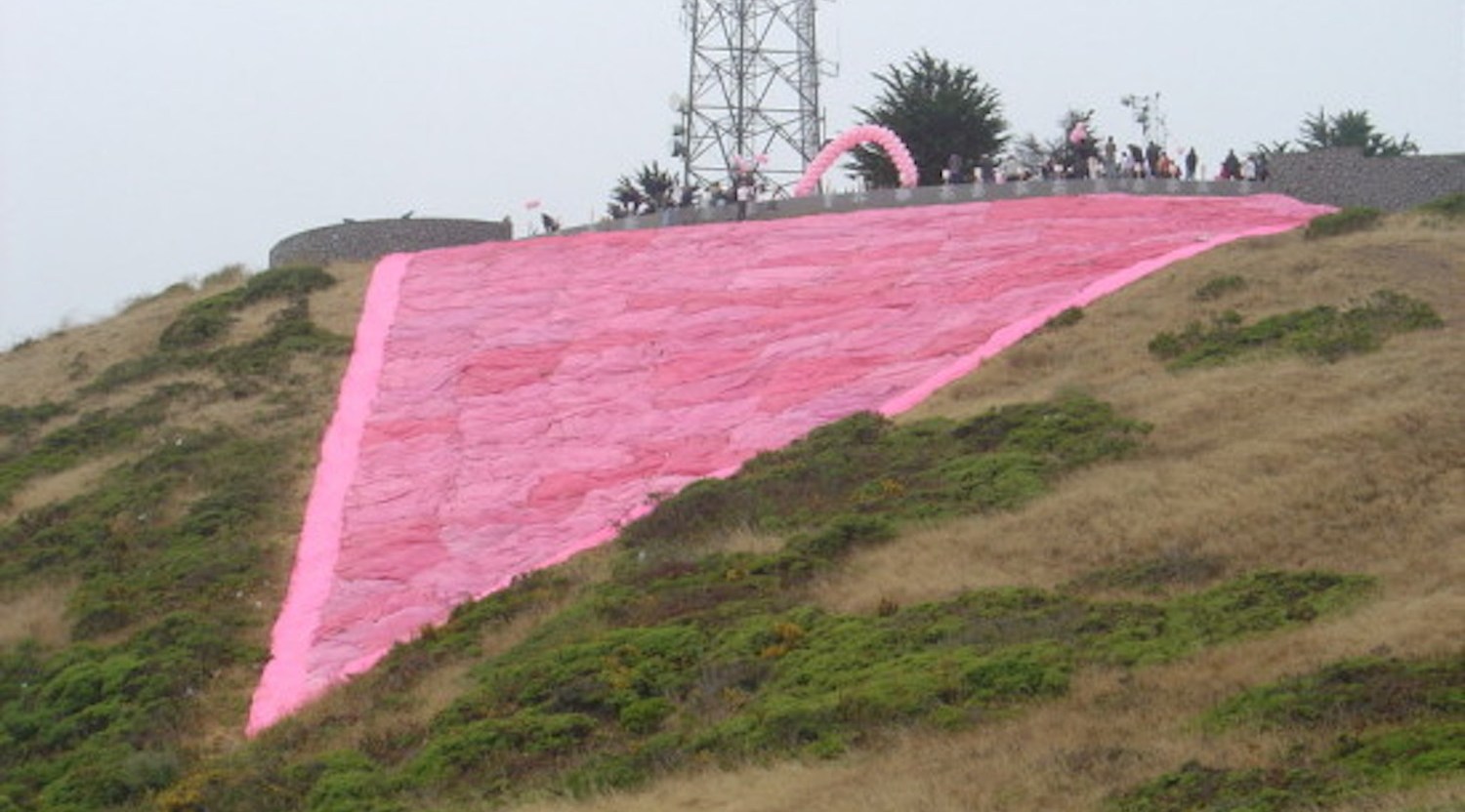 Volunteers install giant pink triangle on San Francisco's Twin Peaks