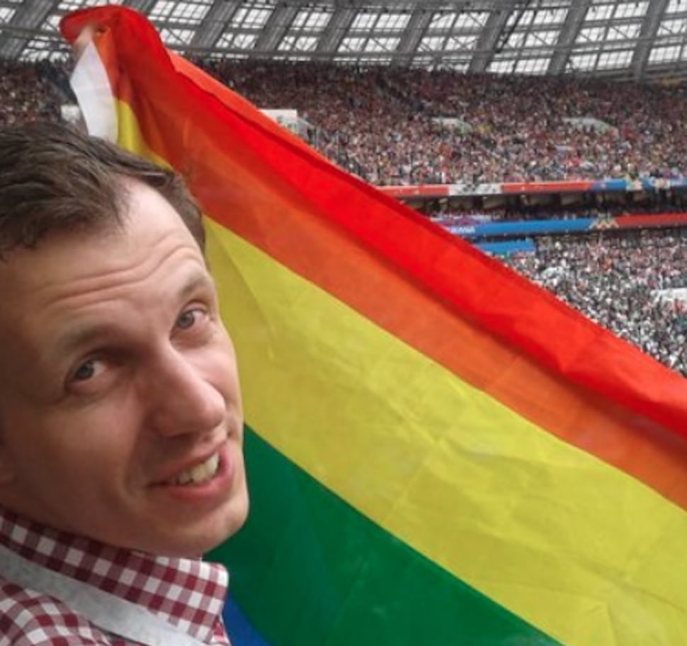 Russian LGBT activist waves rainbow flag at World Cup opening game ...