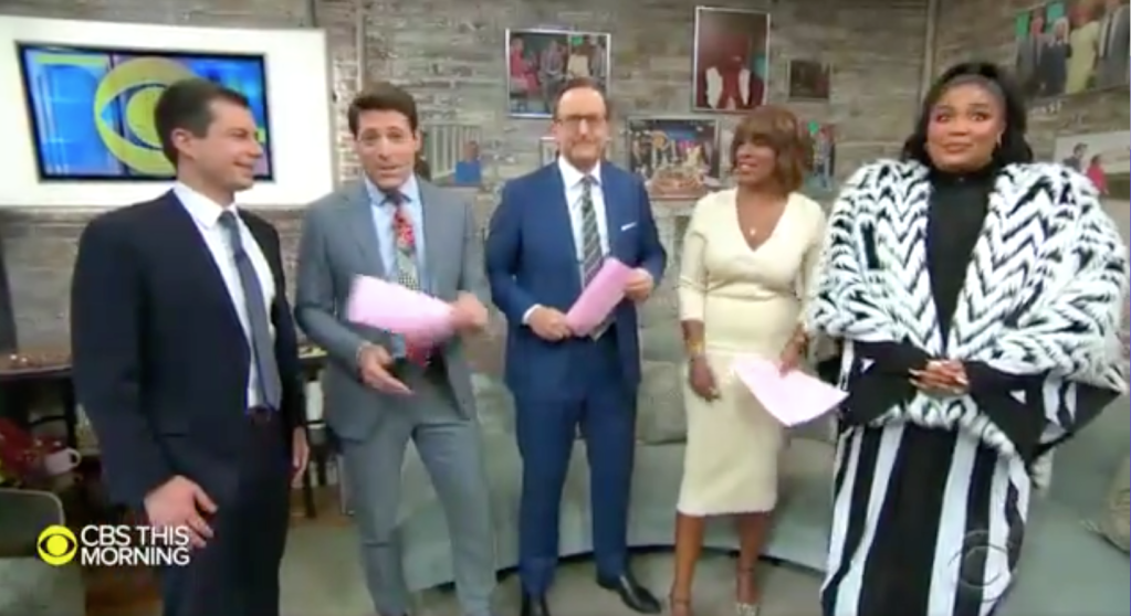 Lizzo carrying a tiny bag 'big enough for my f***s to give' won the AMAs