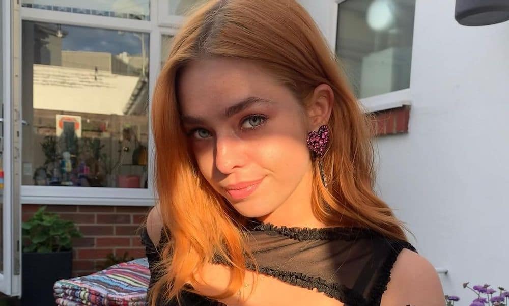 L Devine: Lesbian singer says parents feared she'd 'corrupt' their kids