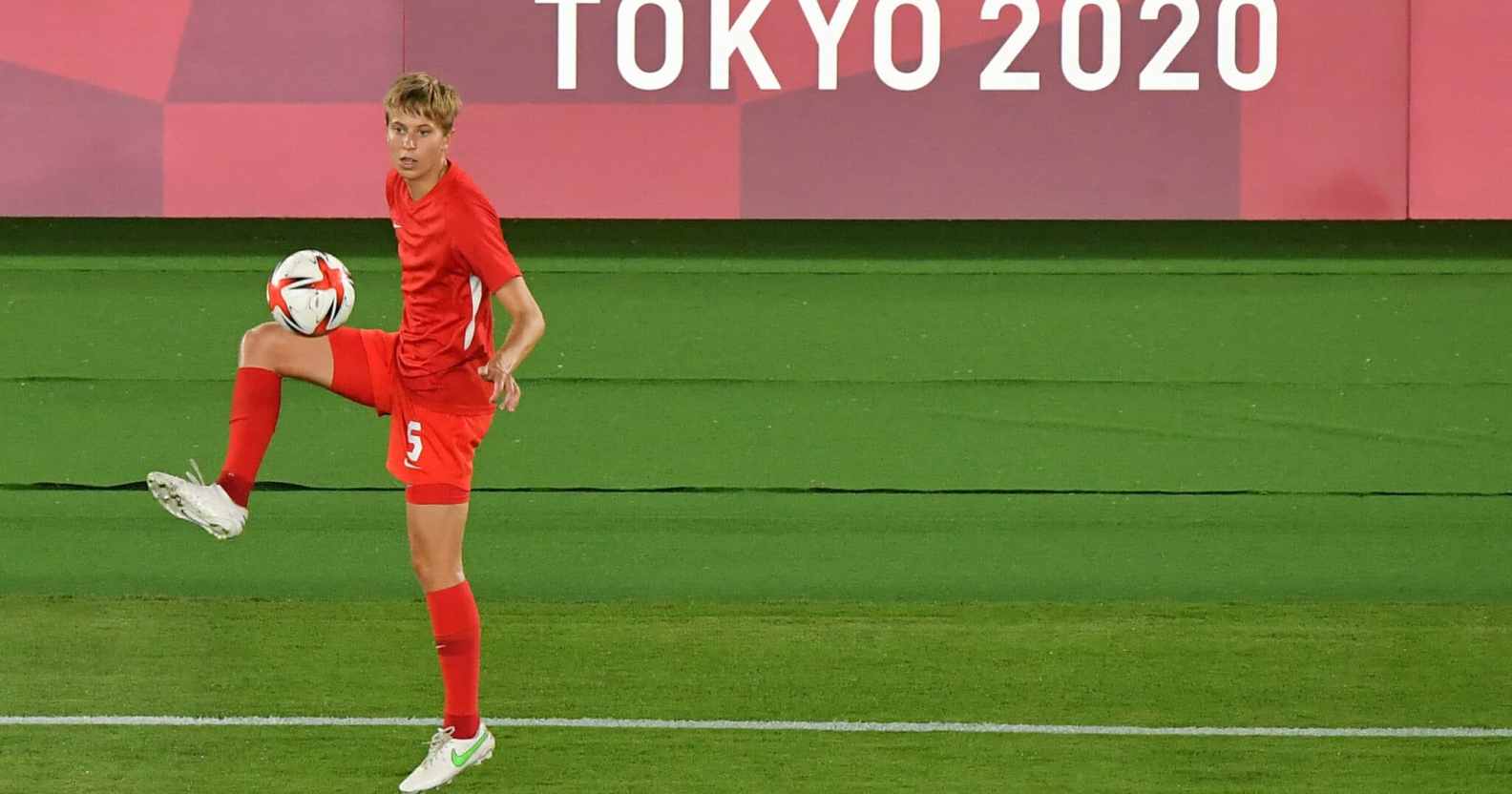 Footballer Quinn makes history as first out trans athlete to win ...