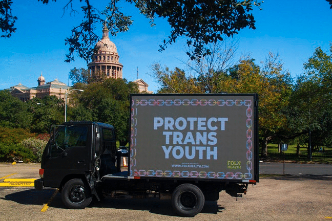 'Trans lives are precious' billboards light up Texas amid trans bans
