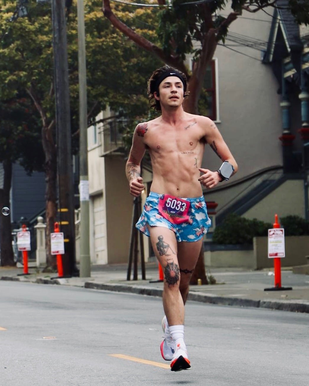 Meet non-binary runner Cal Calamia fighting for equality in athletics