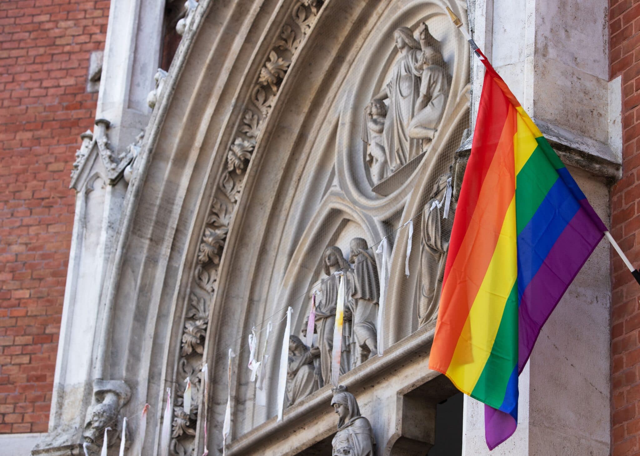 Catholic priest who burned rainbow flag 'removed from church' | PinkNews