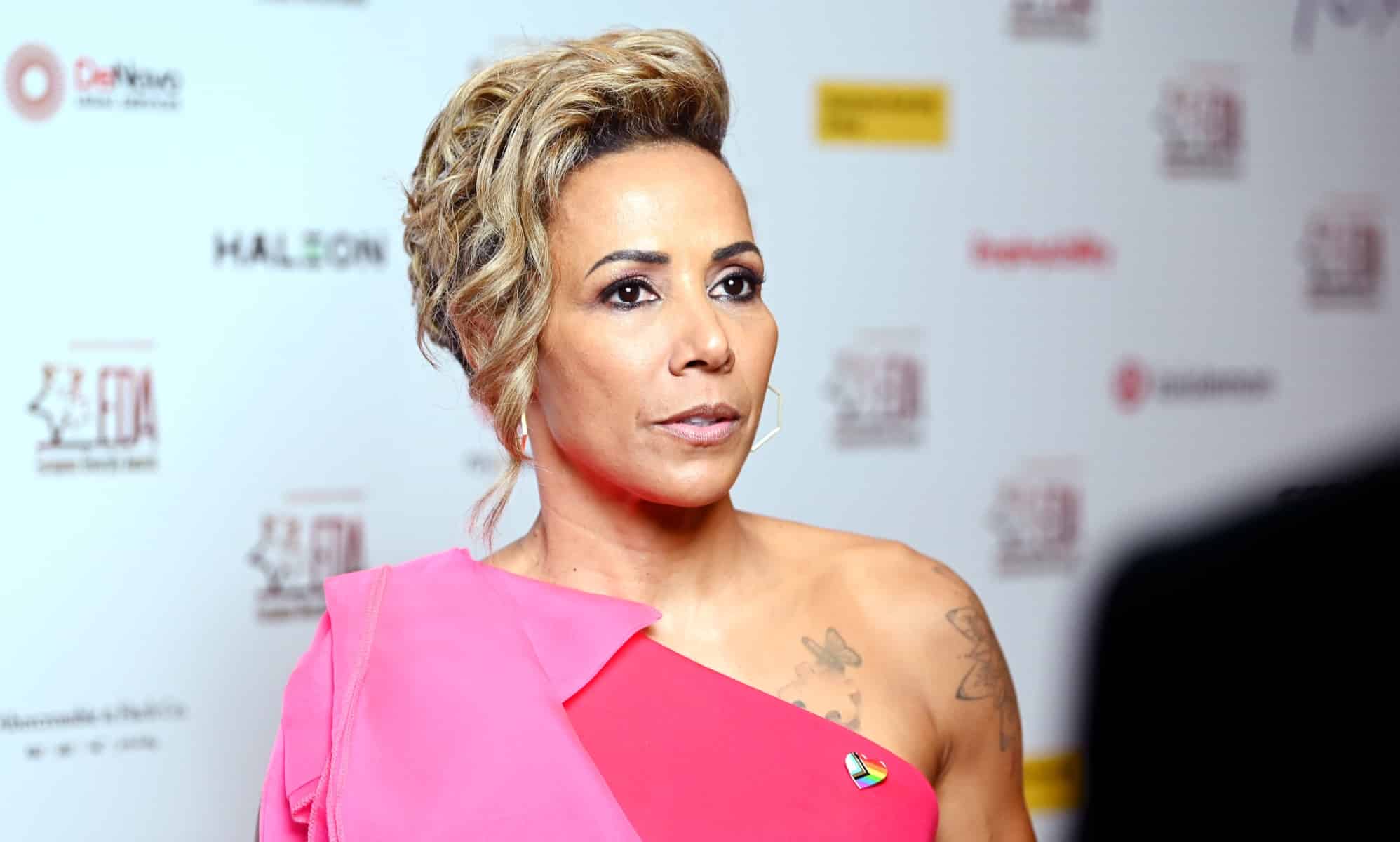 Kelly Holmes feared girlfriends would force her to come out as ga