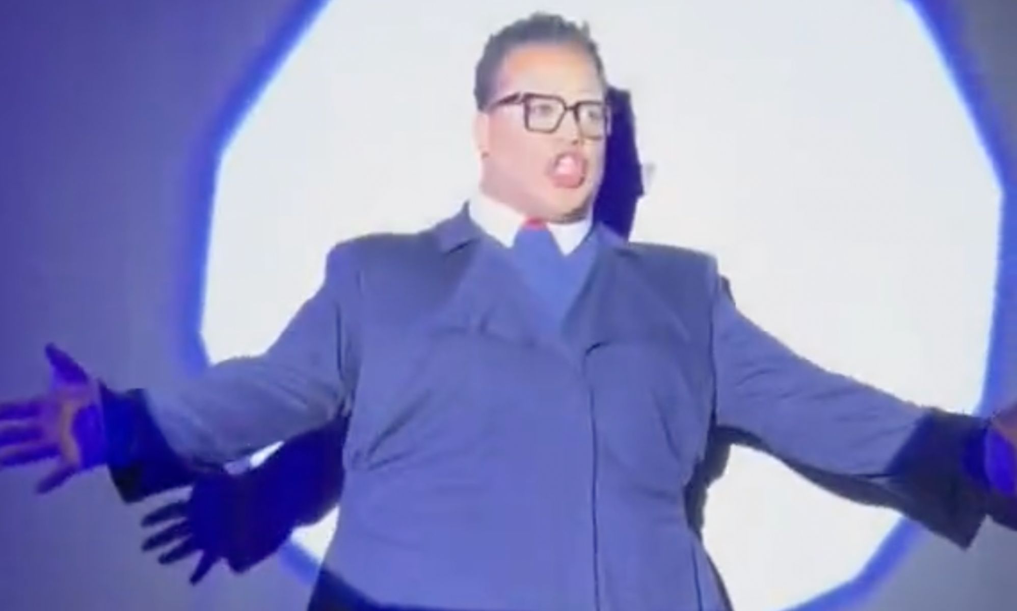 Drag queen lip syncs as George Santos and Kitara Ravache