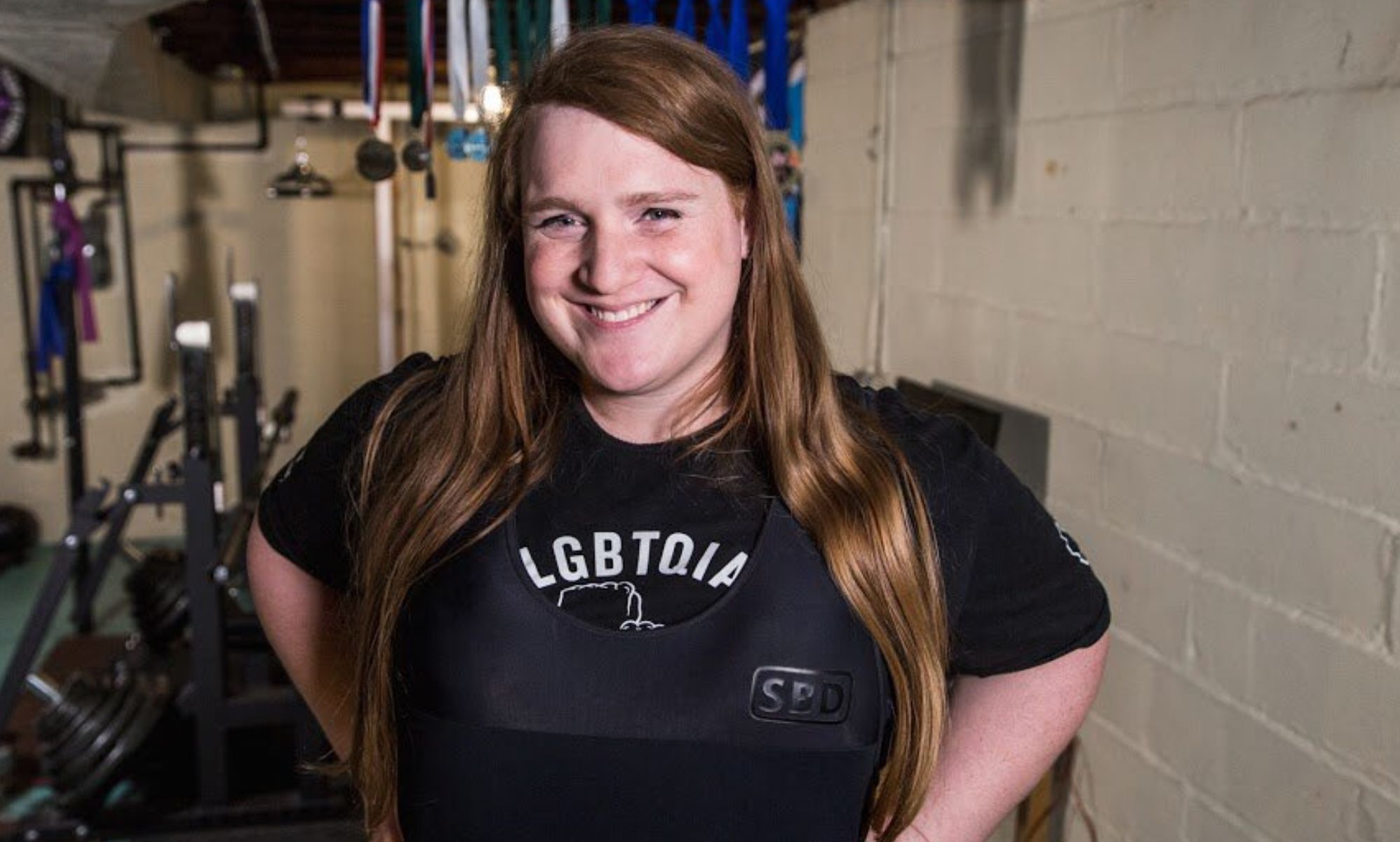 Trans powerlifter JayCee Cooper wins discrimination settlement after ...