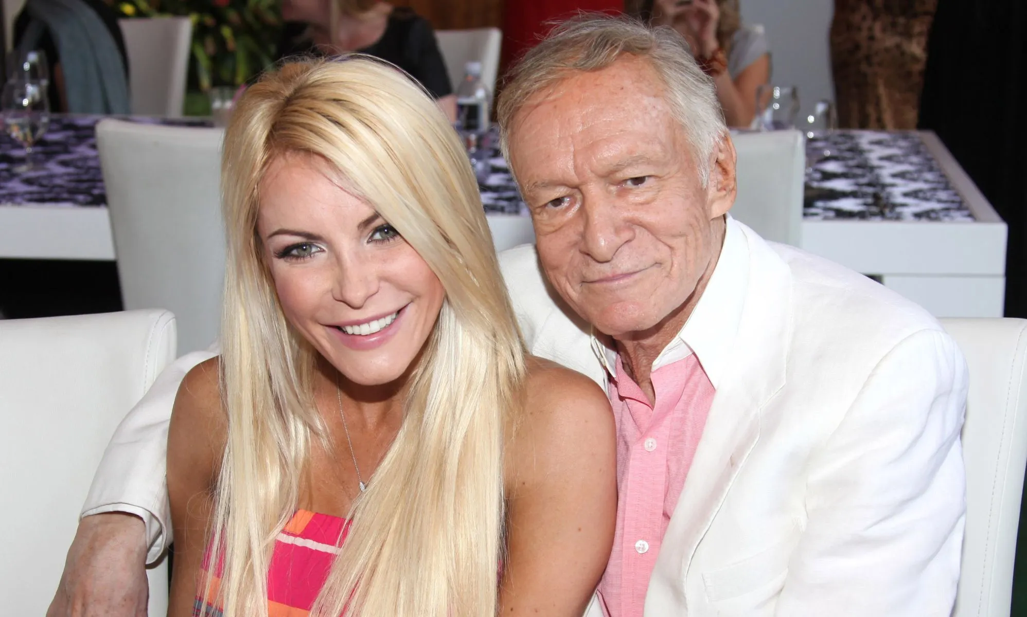 Hugh Hefner’s wife suggests he slept with men: 'He was very open'