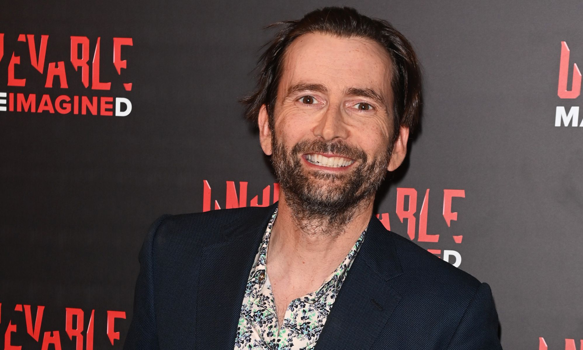 David Tennant's trans badge raises thousands for LGBTQ+ charity
