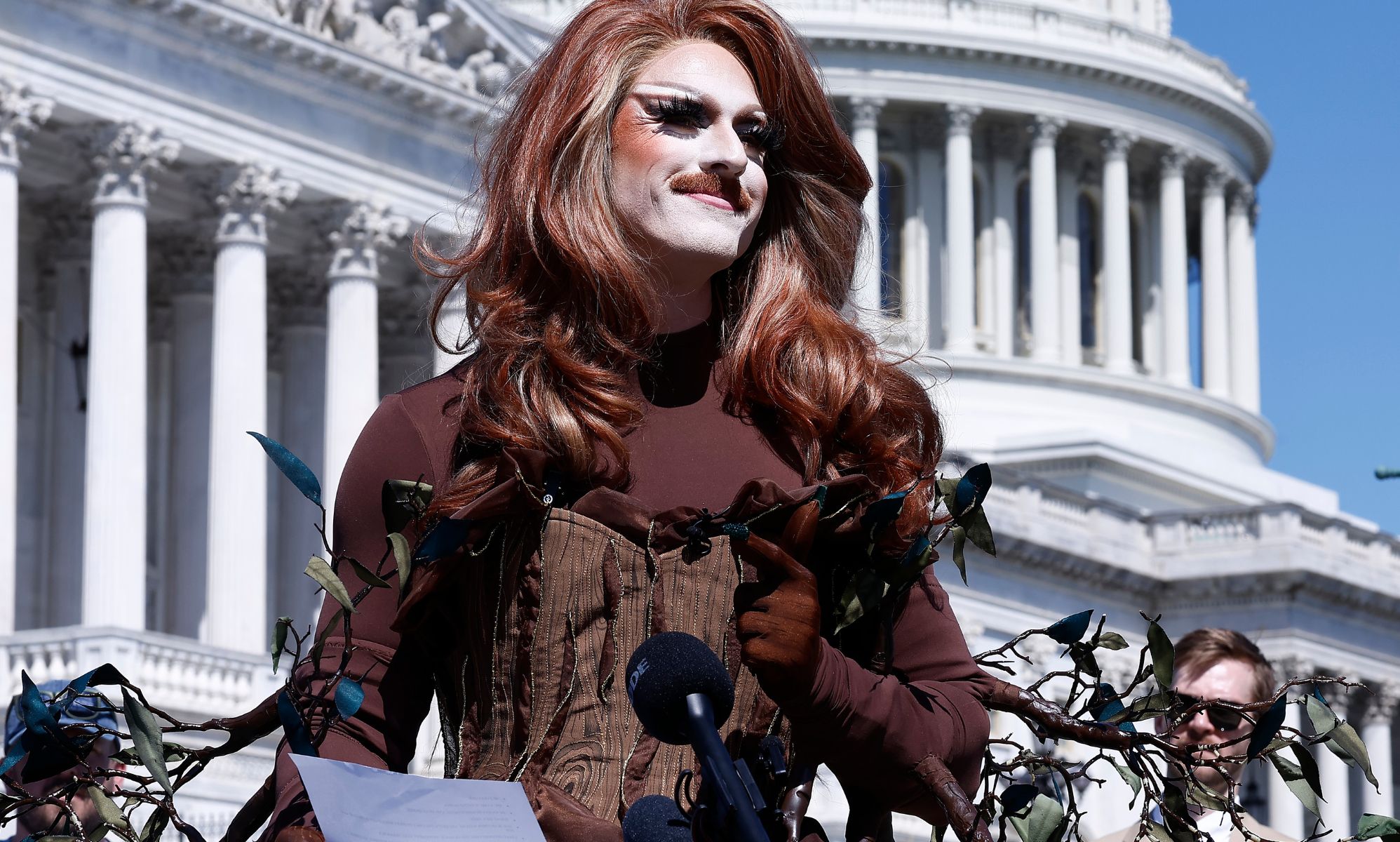Drag queen dresses as tree in US senate, gets endorsed by AOC