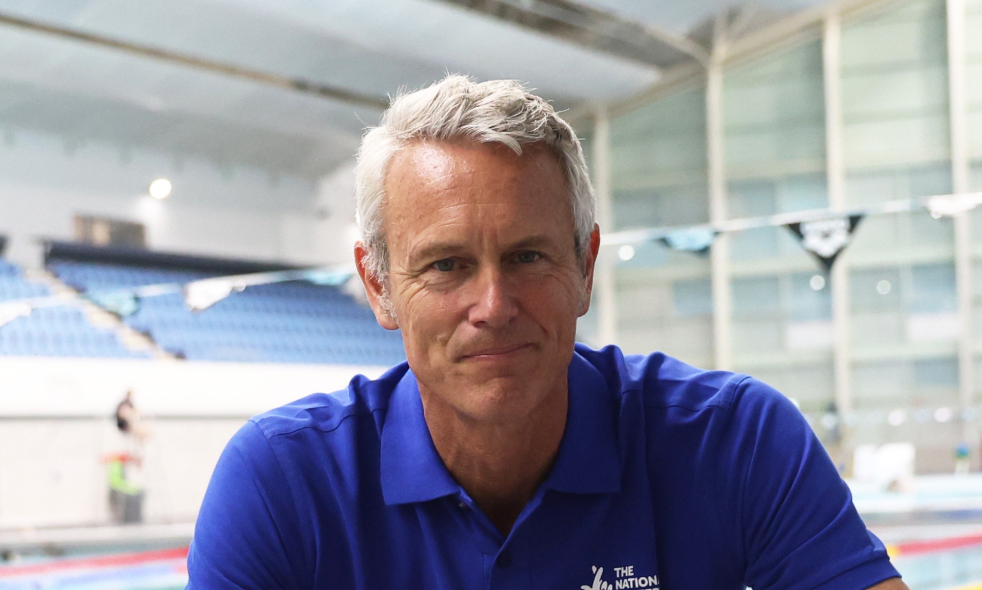 Does gay swimmer Mark Foster have a partner or Olympic medals?