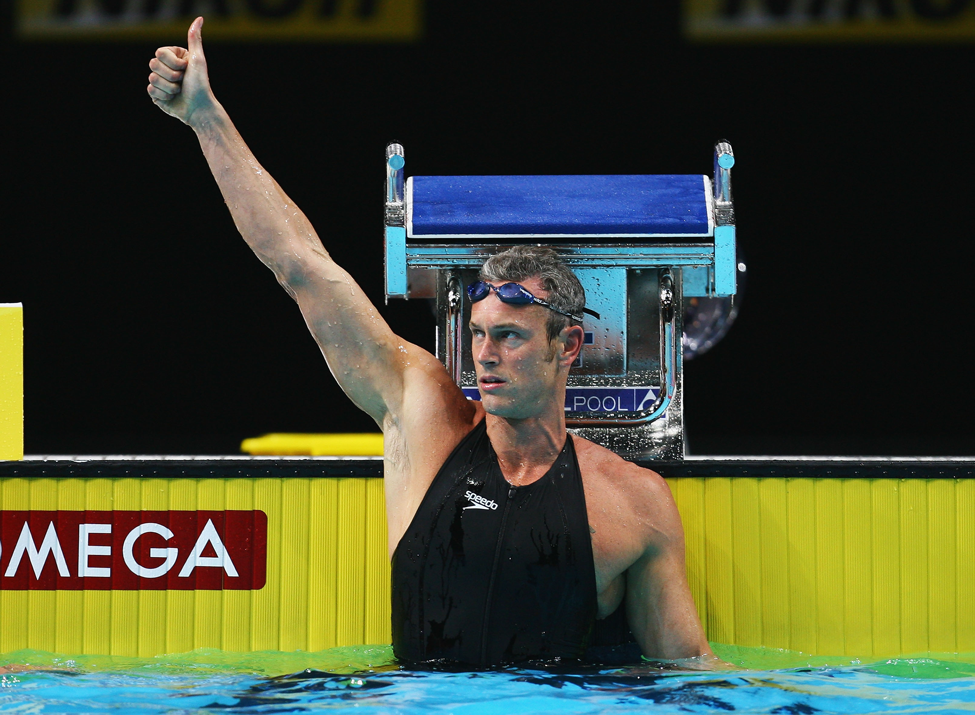 Does gay swimmer Mark Foster have a partner or Olympic medals?