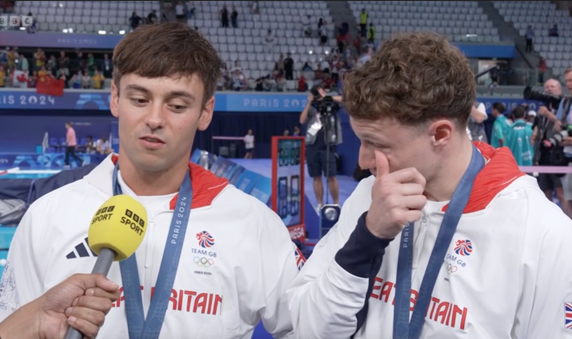 Noah Williams breaks down when asked about diving coach David Jenkins