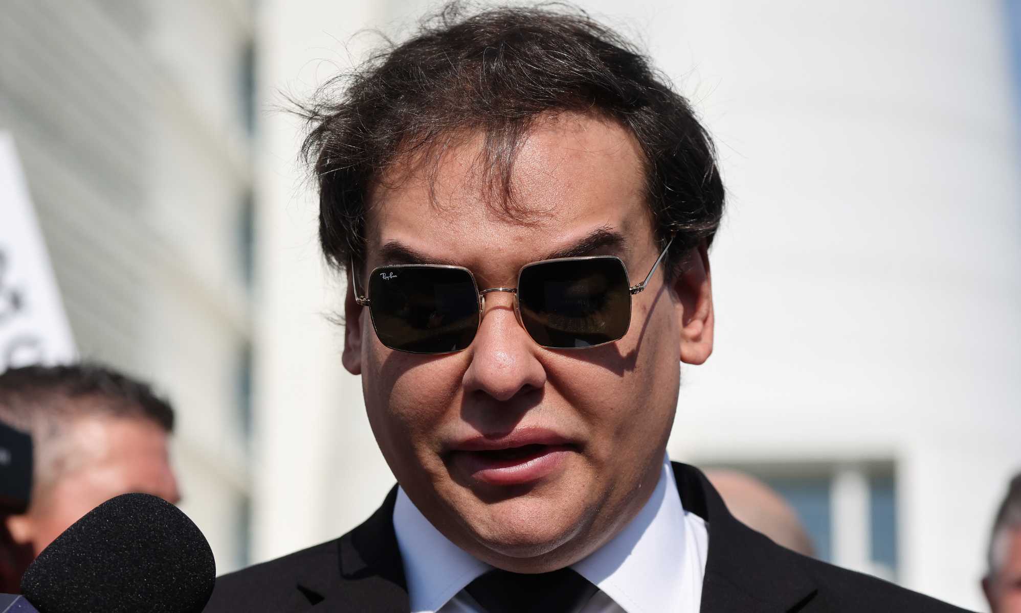 Was George Santos a drag queen?