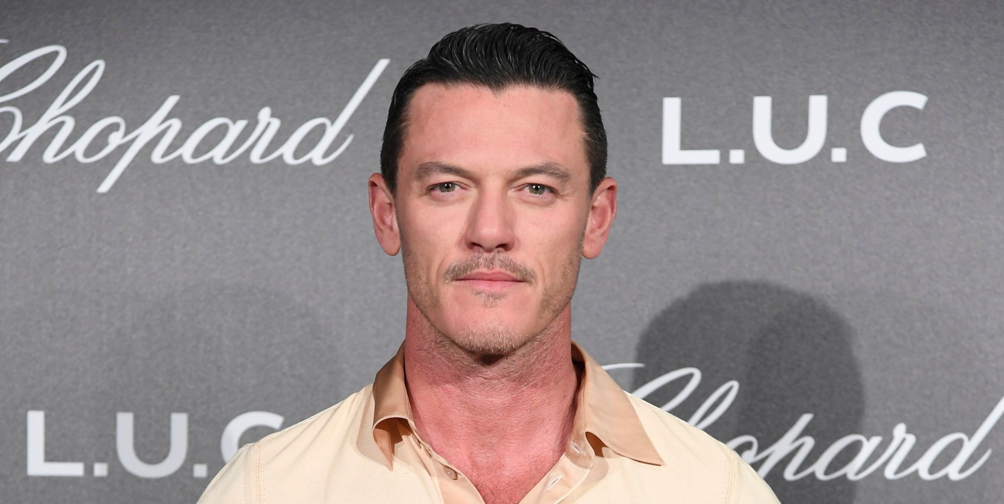 Luke Evans shows off skimpy swimwear with boyfriend Fran Tomas