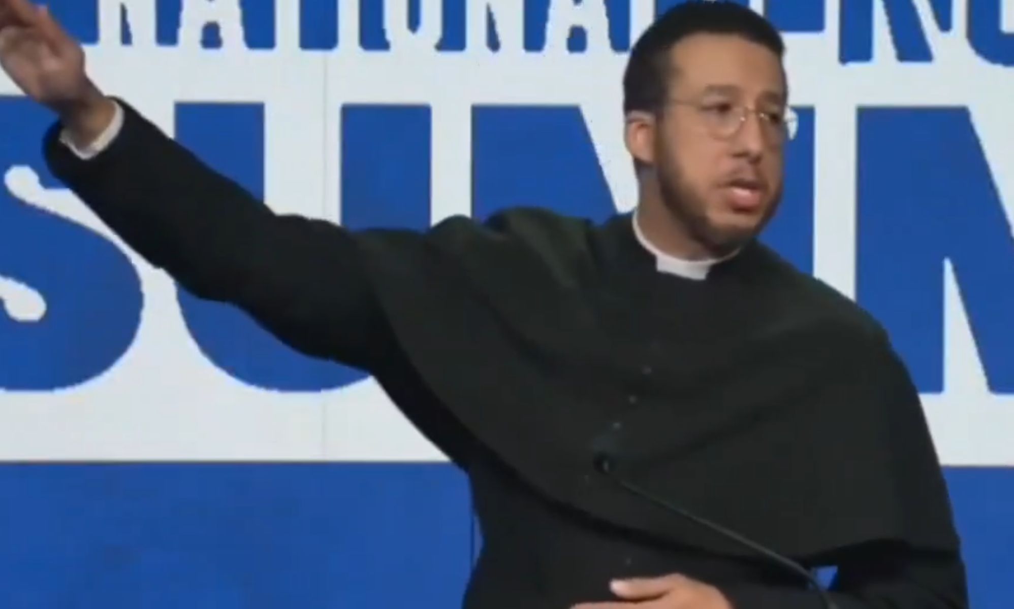 Right-wing priest Calvin Robinson defrocked for imitating 'Nazi salute'