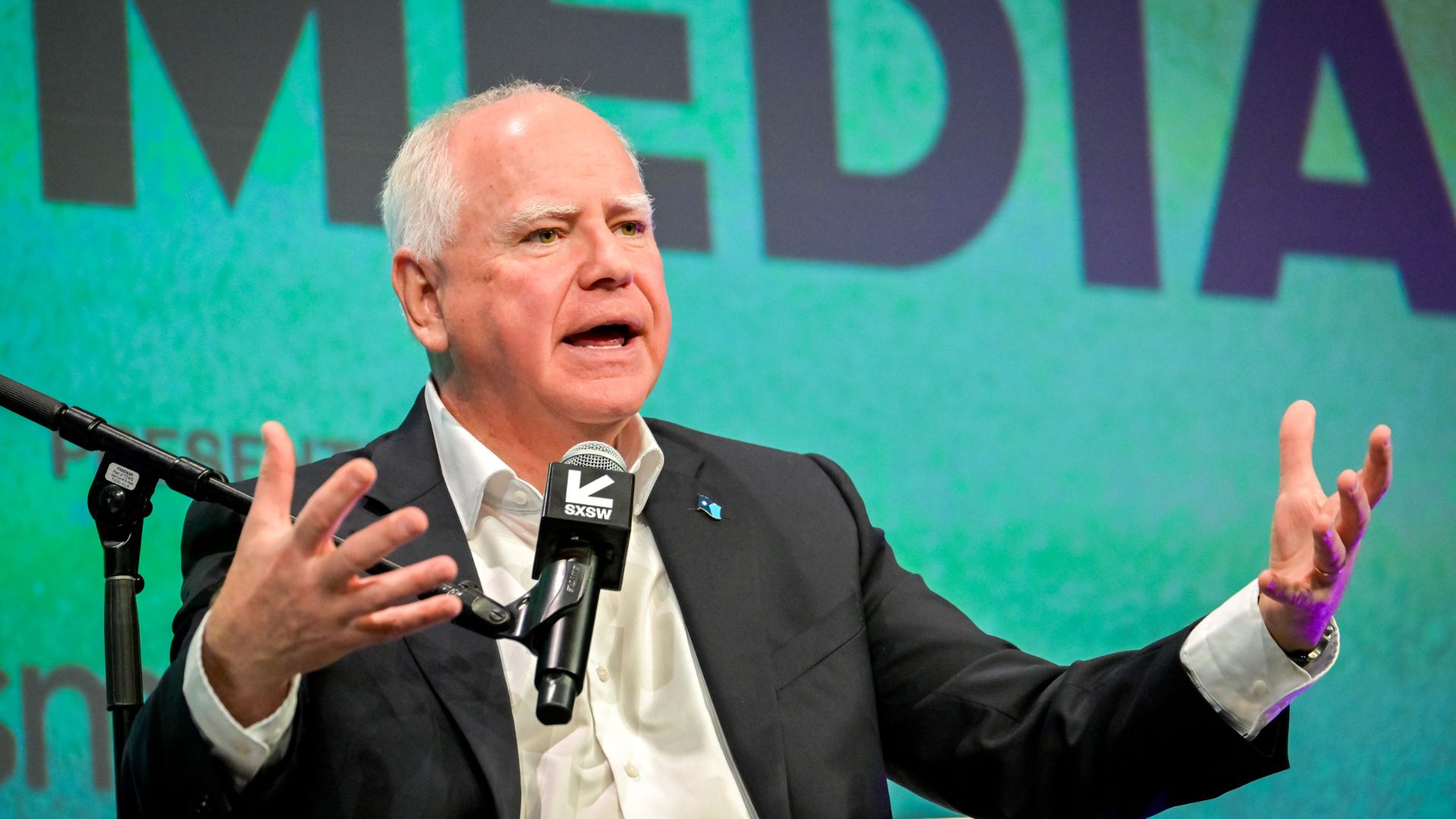 Tim Walz says Tesla's plunging stock price gives him a 'boost'