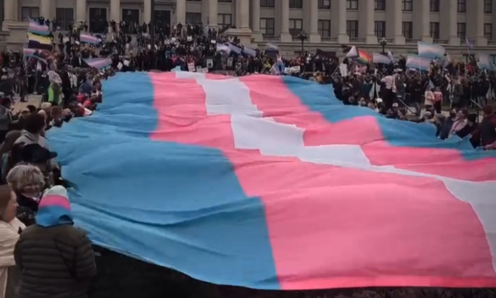 Utah activists unfurl 60-metre trans banner to protest Pride flag ban