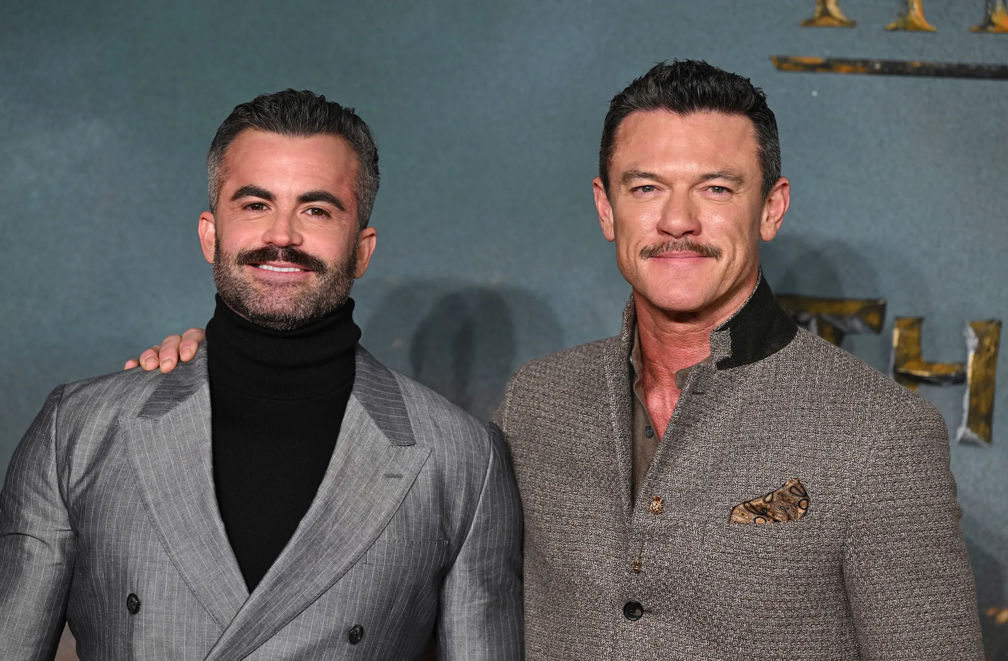 Luke Evans shows off skimpy swimwear with boyfriend Fran Tomas