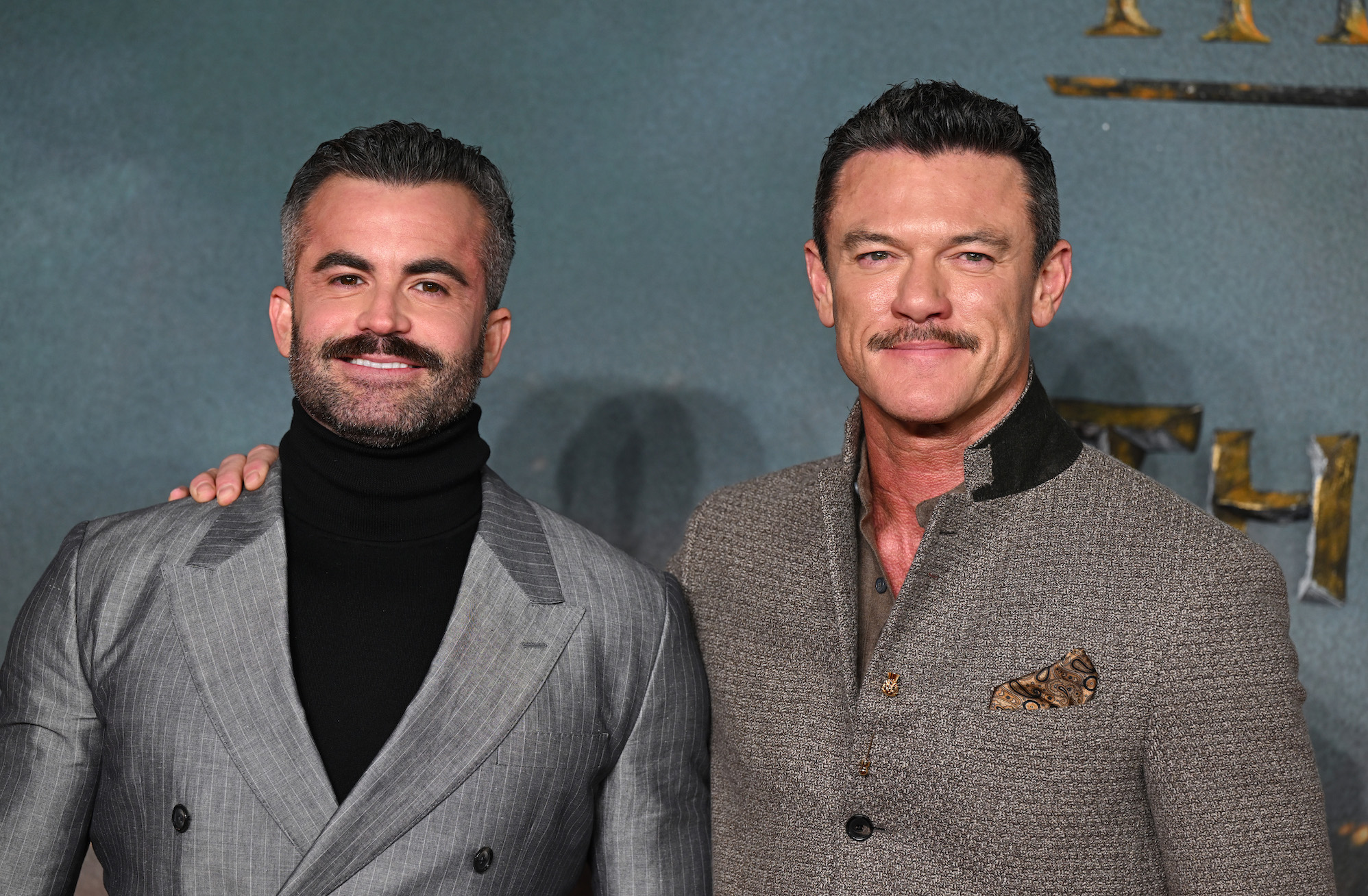 Luke Evans shows off skimpy swimwear with boyfriend Fran Tomas