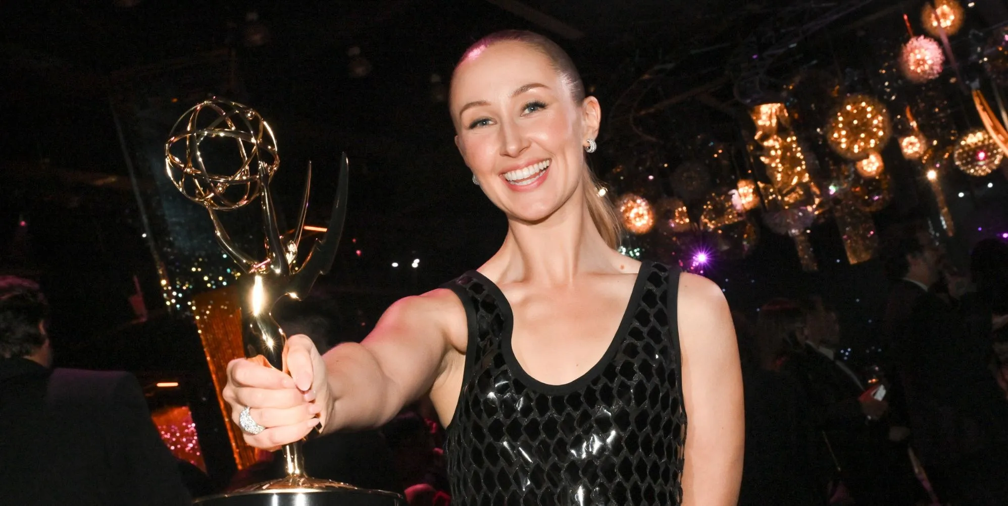 Adolescence star Erin Doherty kisses girlfriend after Emmy win