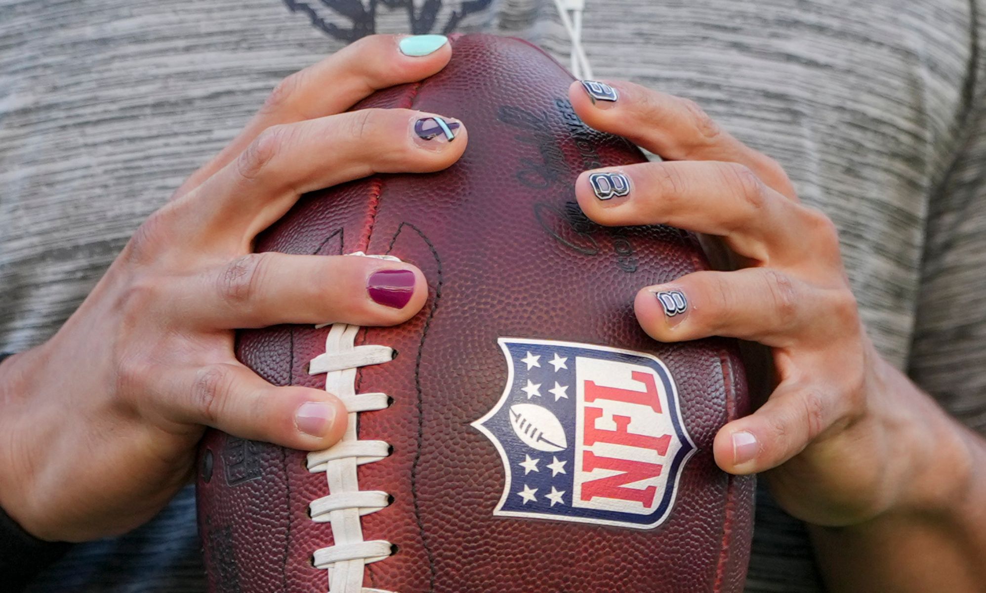 NFL star Caleb Williams paints nails in honour of suicide hotline