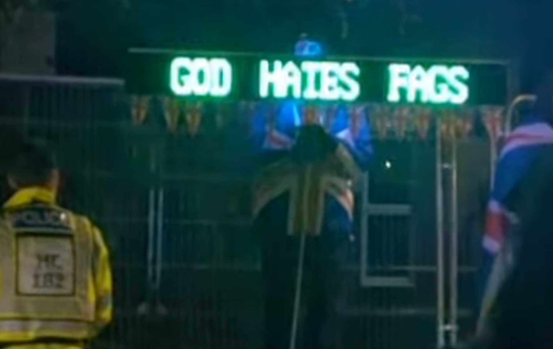 Man arrested for allegedly displaying homophobic sign at protest